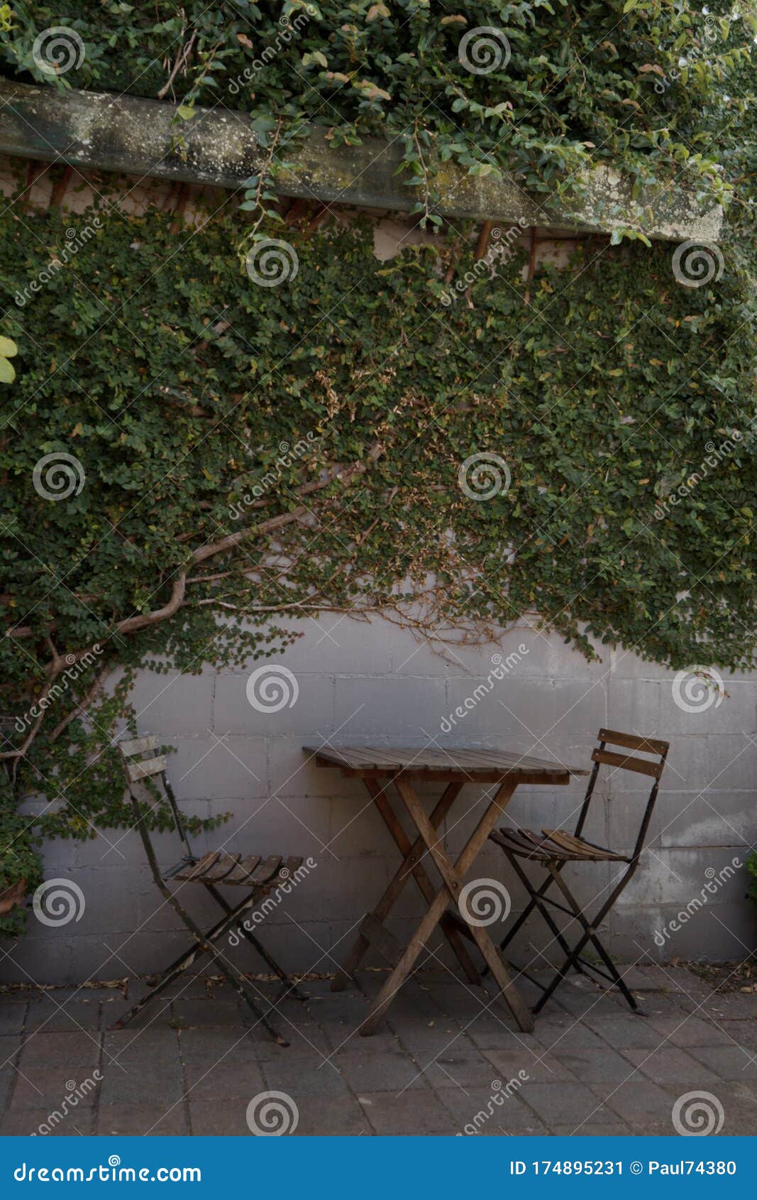 Outdoor Seating in Cafe with Empty Wooden Table and Two Empty Chairs ...