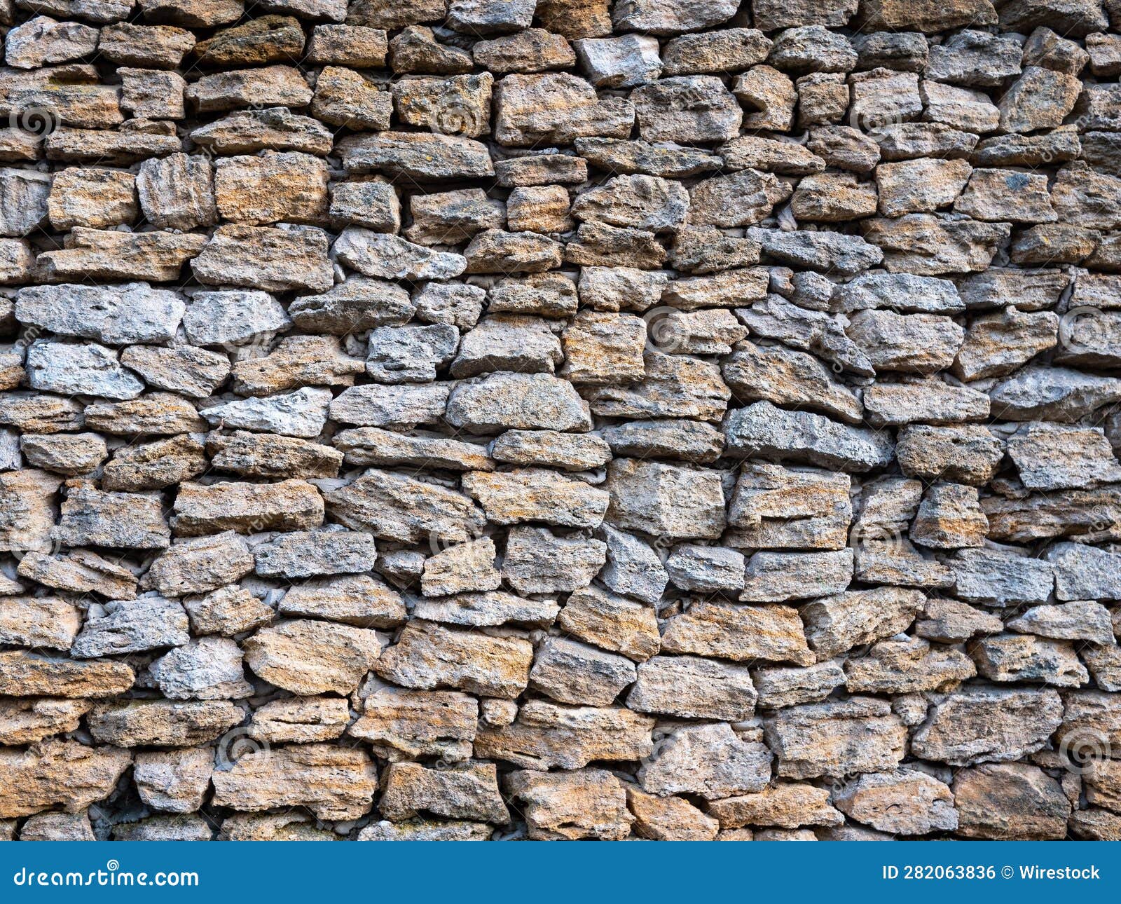 Outdoor Stone Wall Composed of Assorted Sizes of Rocks Stock Photo ...