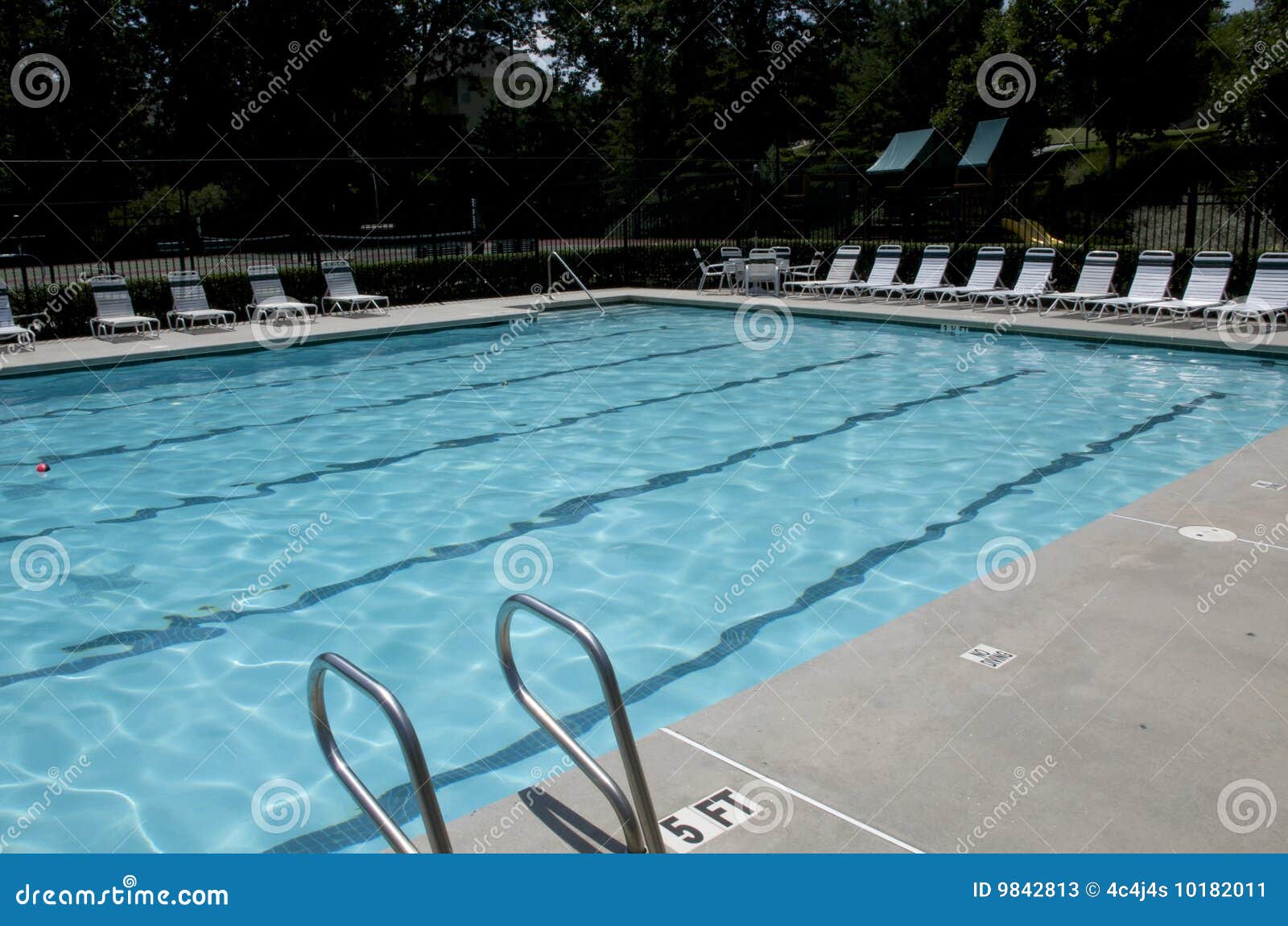 Outdoor swimming pool stock image. Image of seating, vacation - 9842813