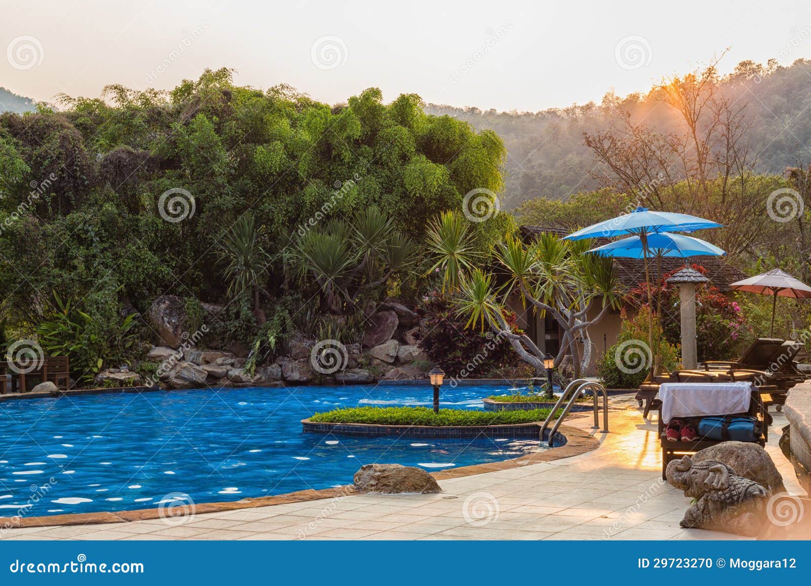 Outdoor Swimming Pool in Sunset Time Stock Photo - Image of luxurious ...
