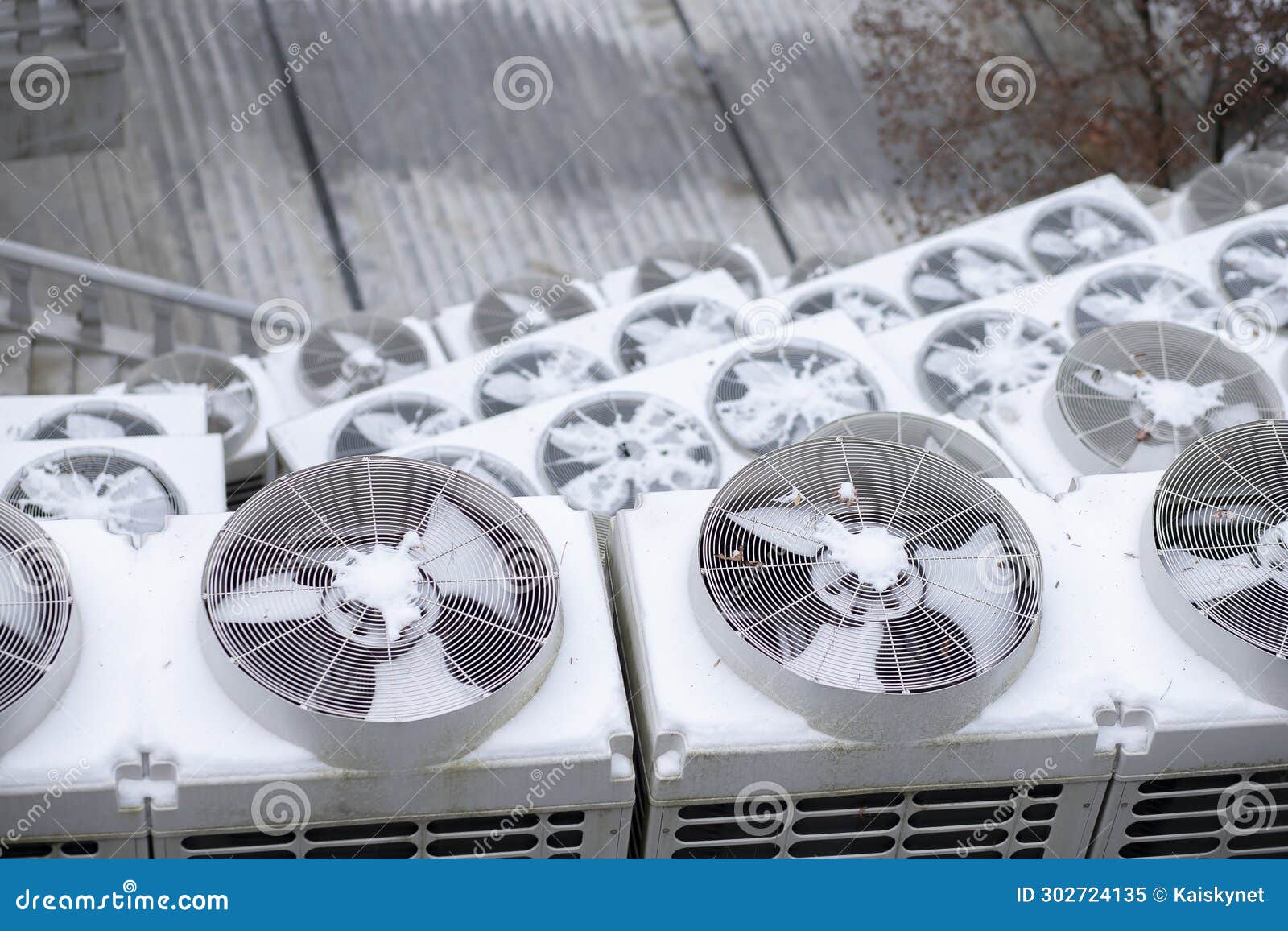 The Outdoor Unit of the Air Conditioner in the Snow during Winter Stock ...