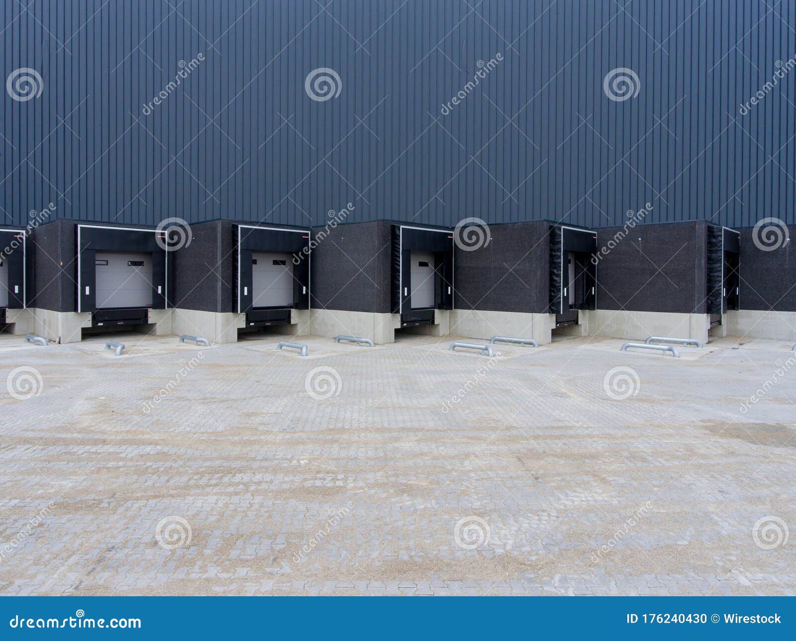 Outdoor View of Loading Docks of a Warehouse with Gray Facade Stock ...