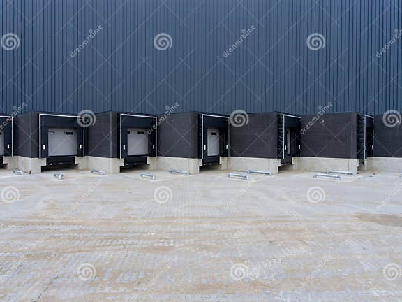 Outdoor View of Loading Docks of a Warehouse with Gray Facade Stock ...