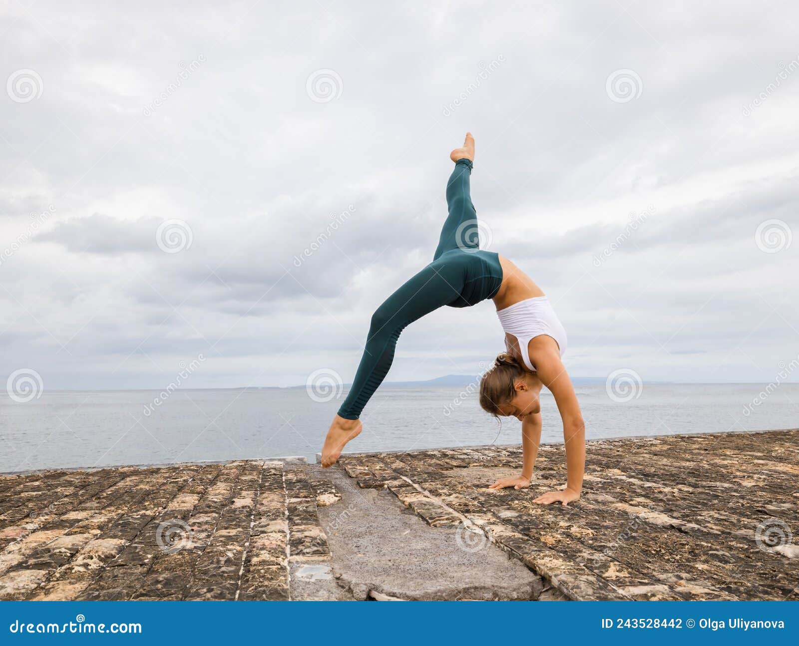 Outdoor Yoga Practice Near The Ocean Caucasian Woman Practicing Adho