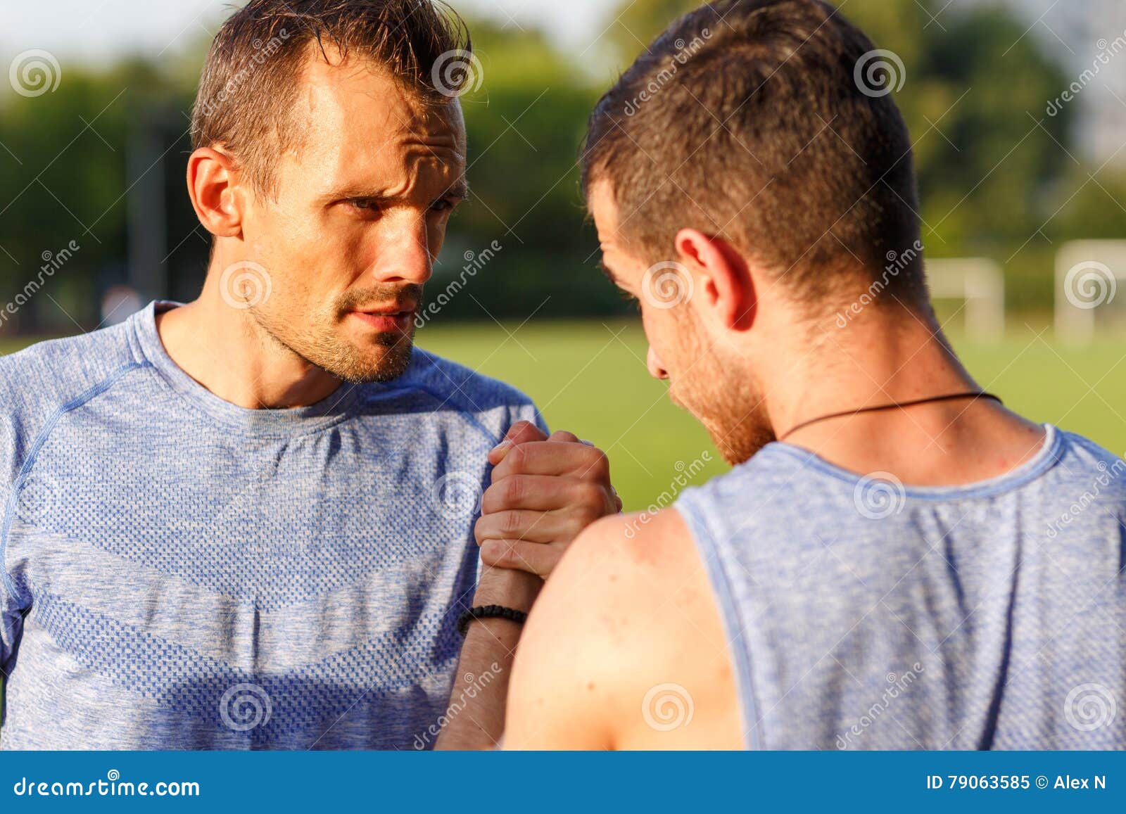 Outdoors Portrait of Serious Strong Men Shake Hands before Competition ...