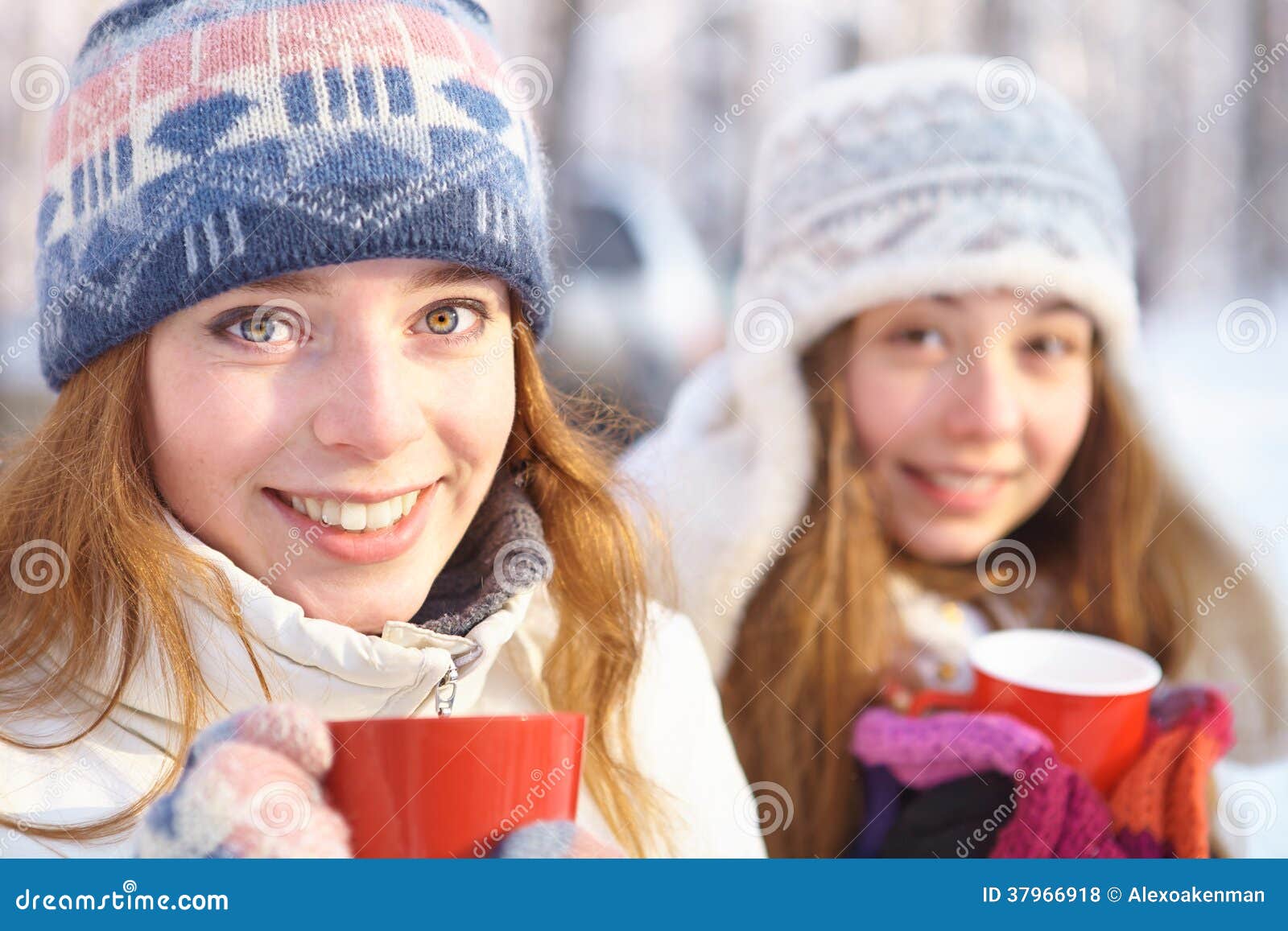 Outdoors on a Winter Day. Girls Drink Tea. Stock Photo - Image of ...