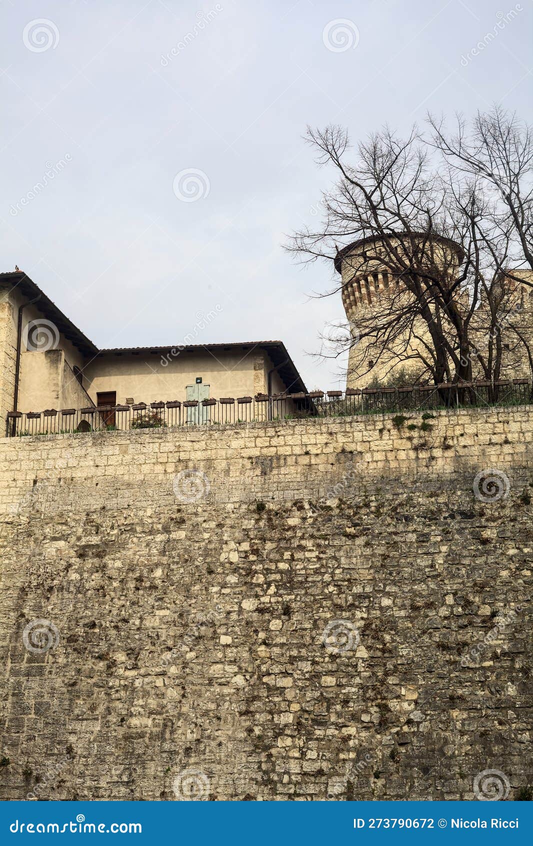 Outer Boundary Wall of a Castle with Trees and a Cloudy Sky As ...