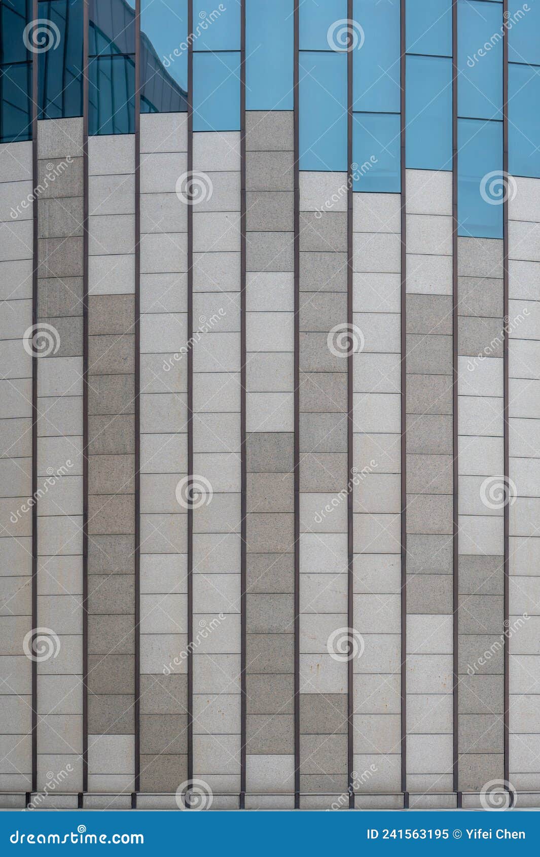 The Outer Wall of a Building Made of Glass and Stone Stock Image ...