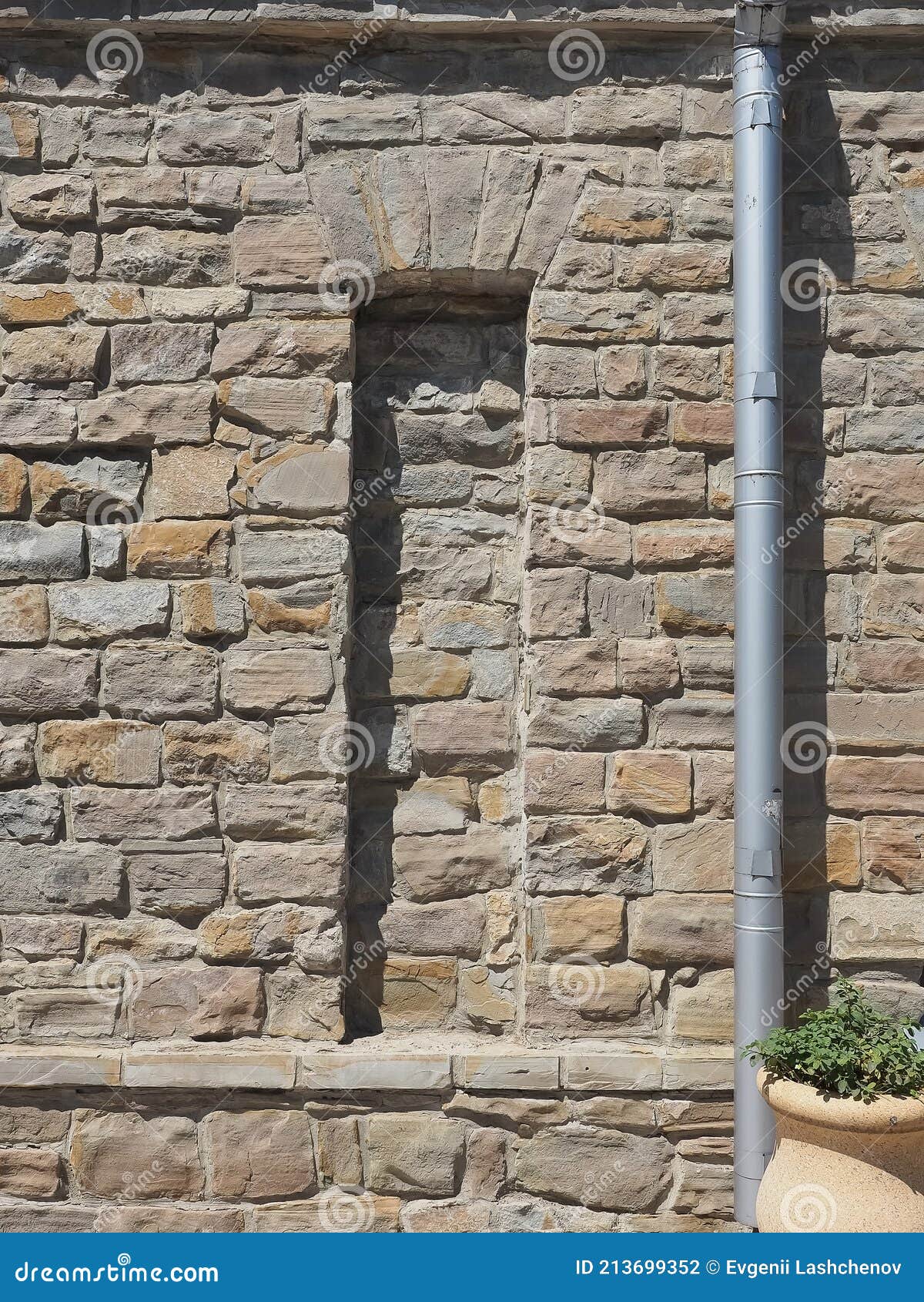 The Outer Wall of a Building with Rough Masonry and a Decorative Recess ...