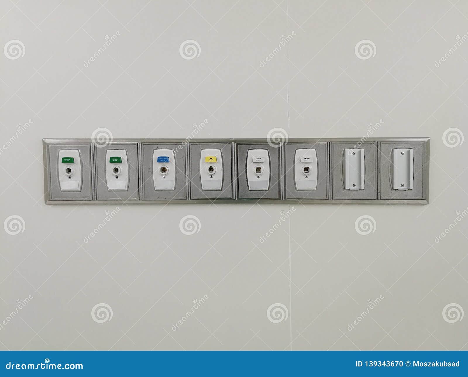 Oxygen And Vacuum Plug Sockets On The Old Concrete Wall In The Hospital ...