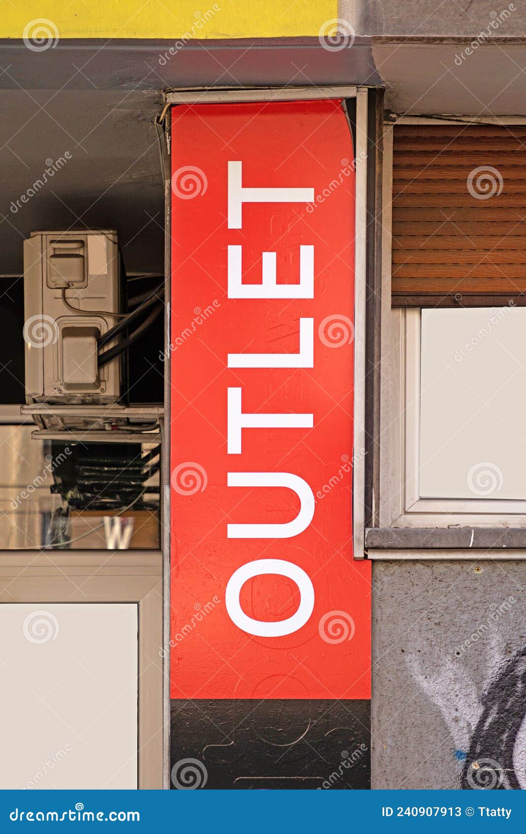 Outlet Sign Banner on Building Stock Image - Image of shop, front ...
