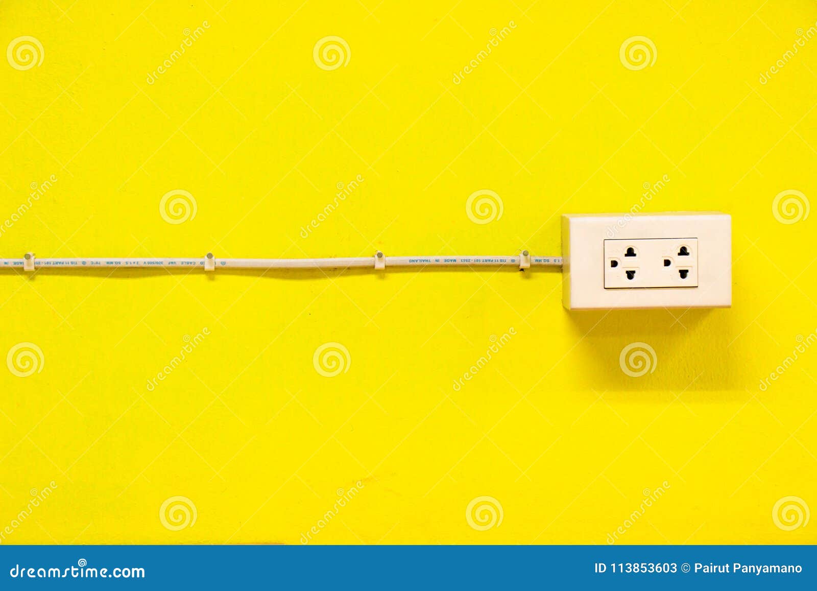 The outlet on yellow wall stock image. Image of duplex - 113853603