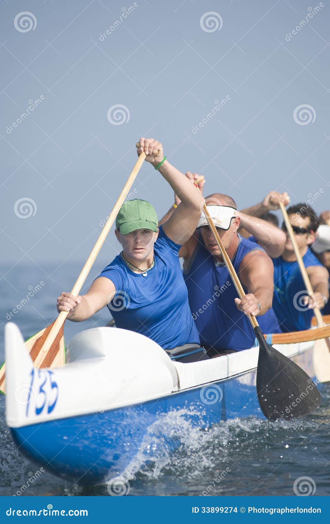 Outrigger Canoeing Team in Race Stock Photo - Image of outrigger ...