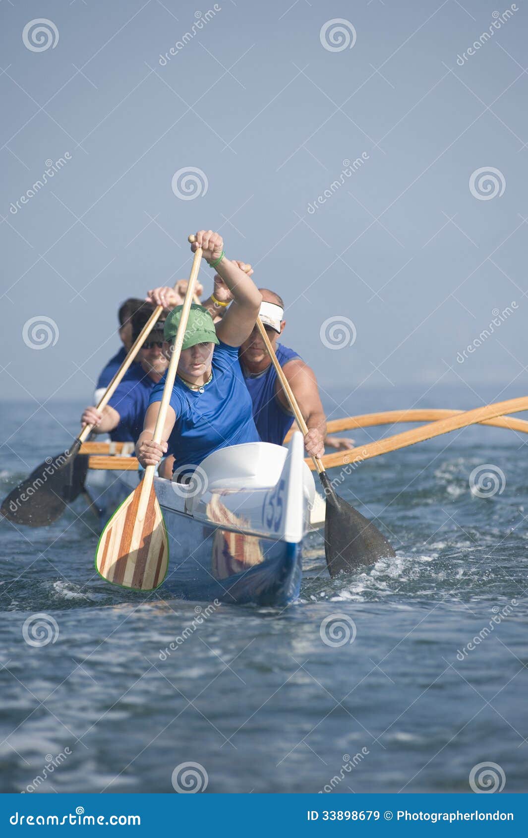 Outrigger Canoeing Team in Race Stock Image - Image of boating, race ...