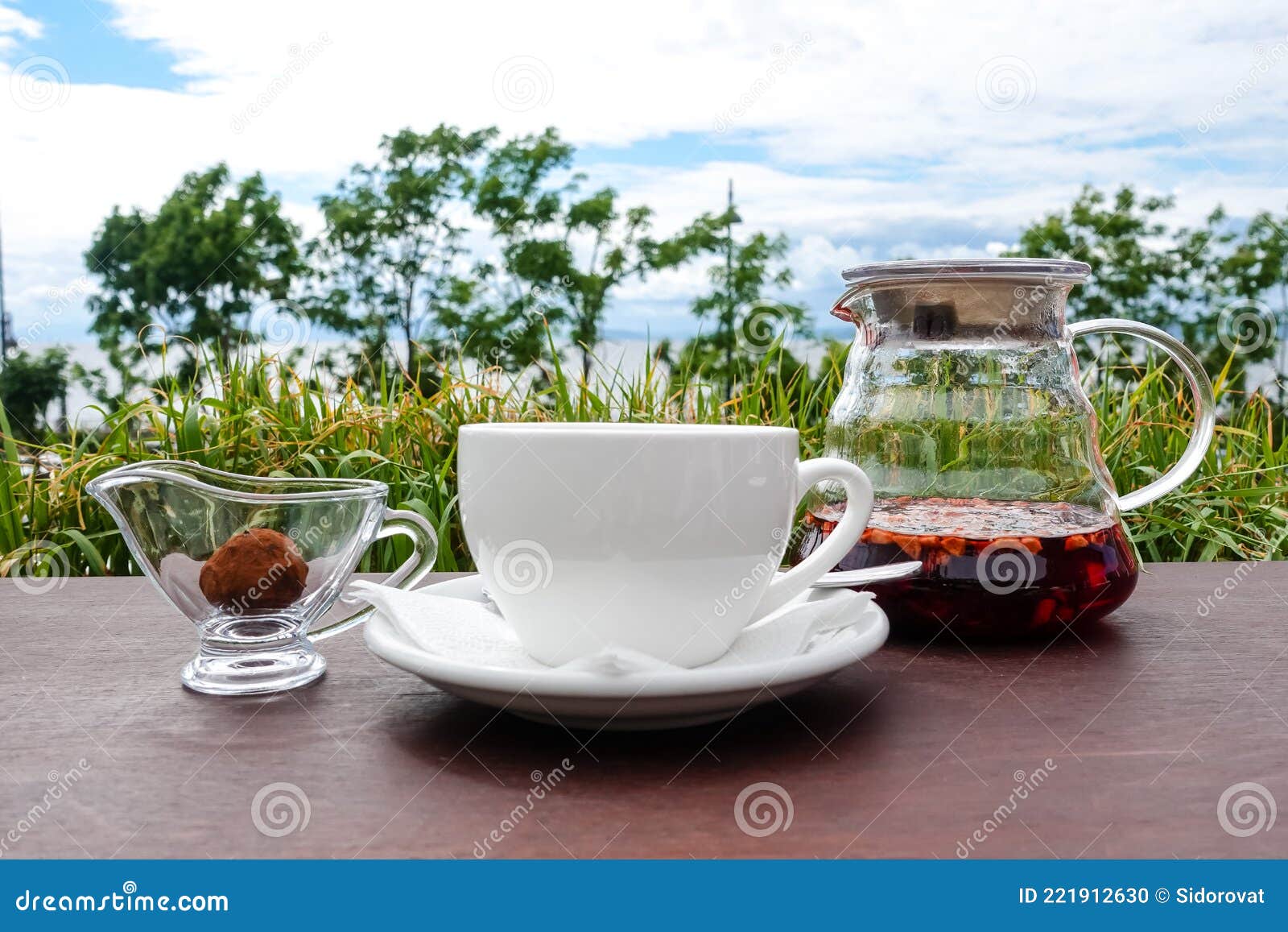 Outside Cafe Terrace Table with Tea Cup and Pitcher Stock Photo - Image ...