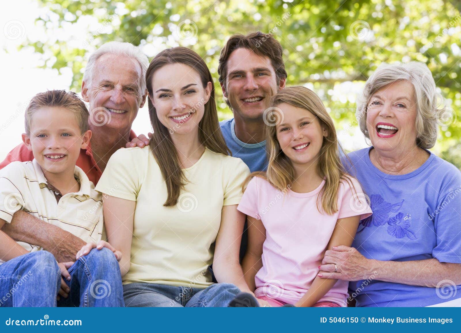 Family Portrait, Mother, Father, Daughter, And Son, Smiling By The Pool ...