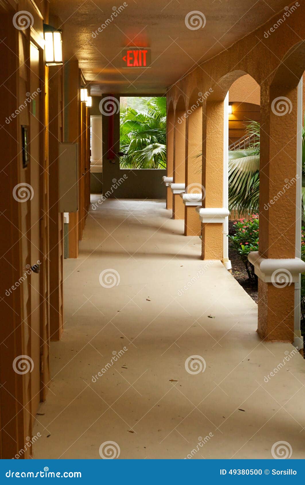 Outside Hallway with Exit Sign Stock Photo - Image of rainy, florida ...