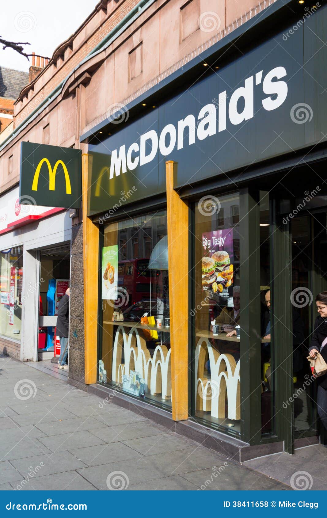 Outside of a McDonalds Store Editorial Stock Photo - Image of people ...