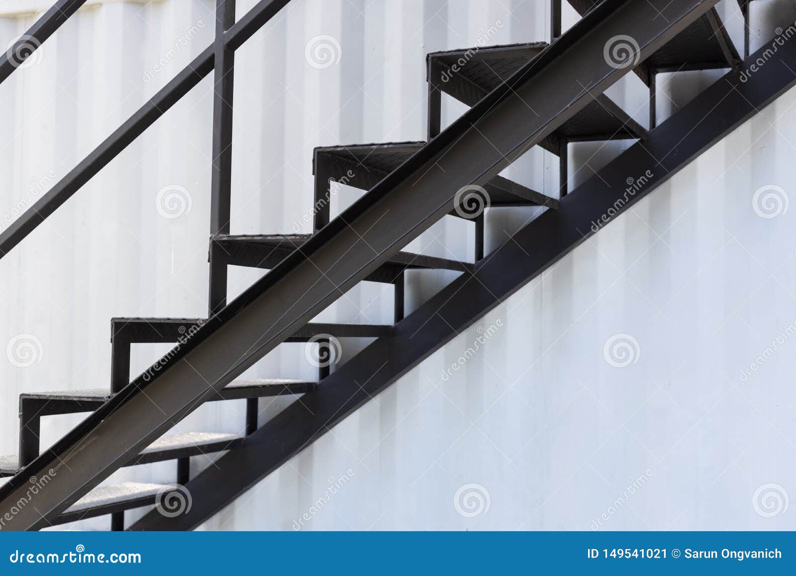 Outside Metal Staircase or Fire Exit Stair with Sheet Corrugated Wall ...