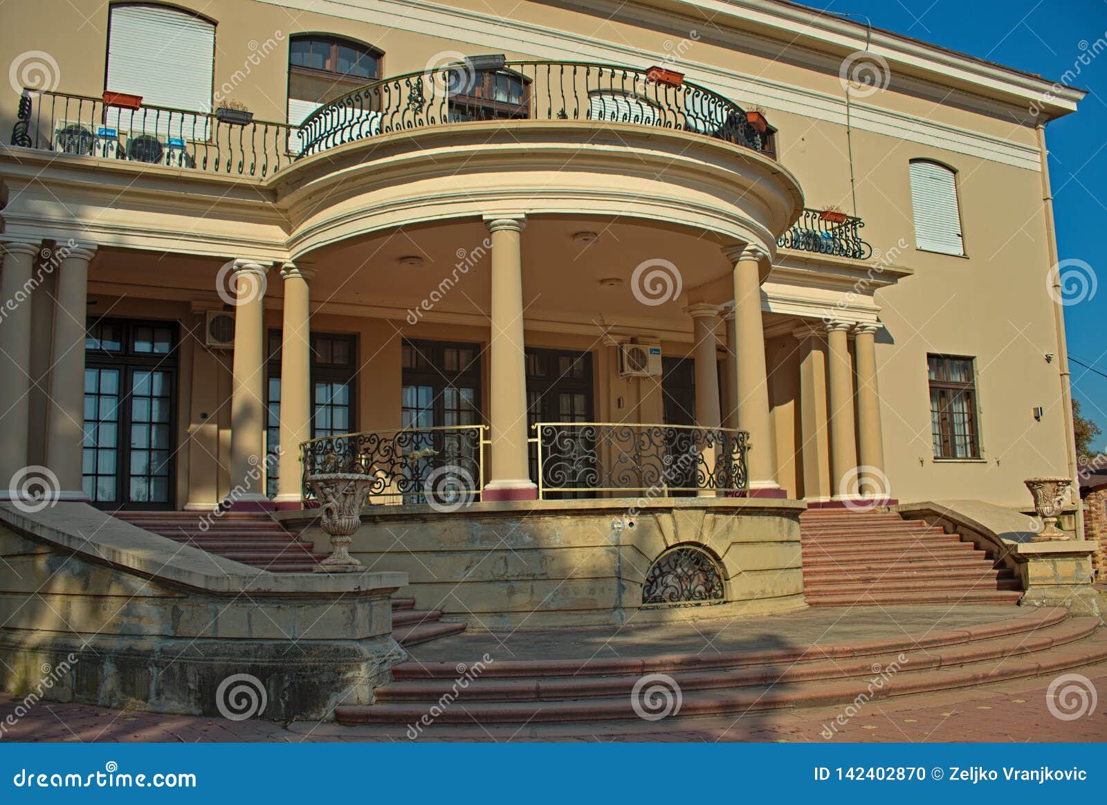 Outside View on Entrance into Villa with Doors, Stairs and Windows ...