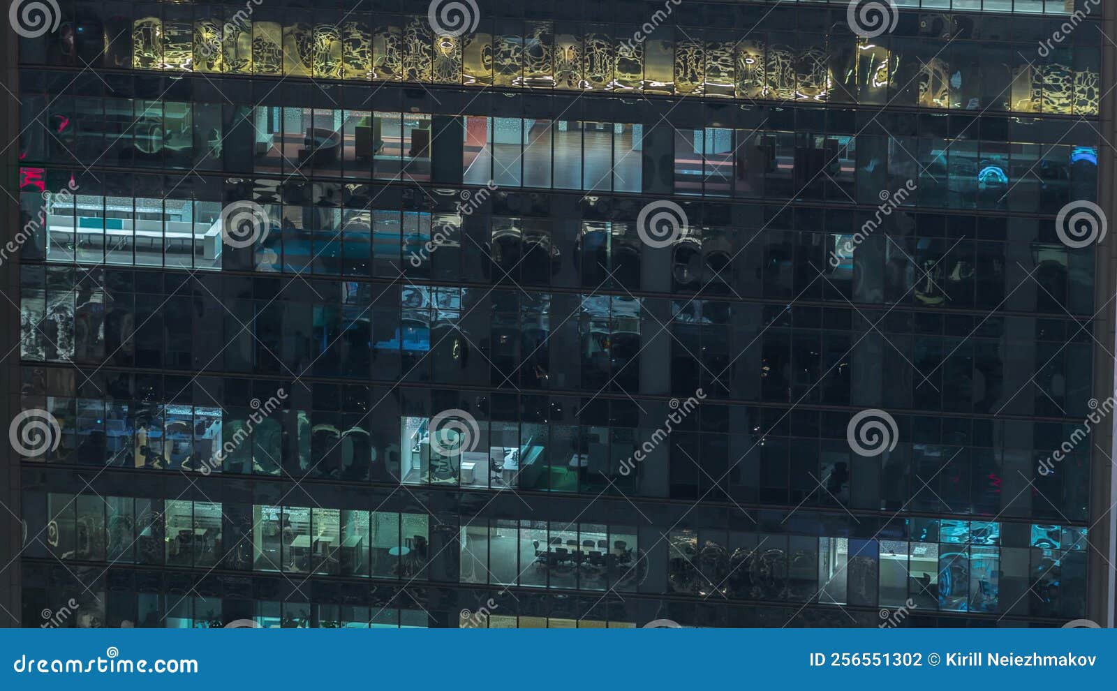 Outside View of Windows in Offices of a High Class Building at Night ...