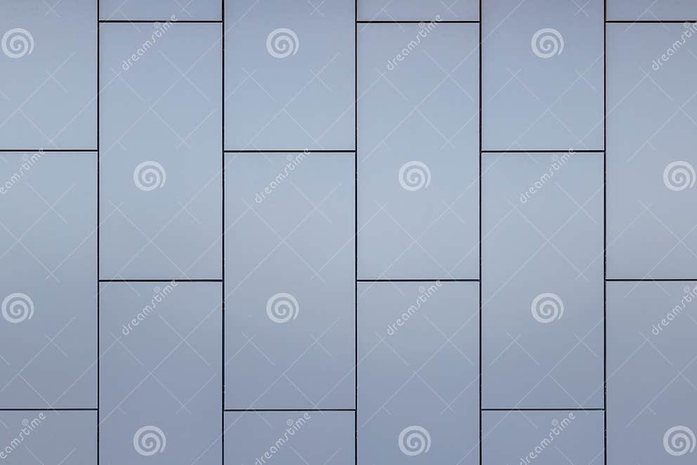 Outside Wall of Building Covered with Grayish Blue Painted Metal ...