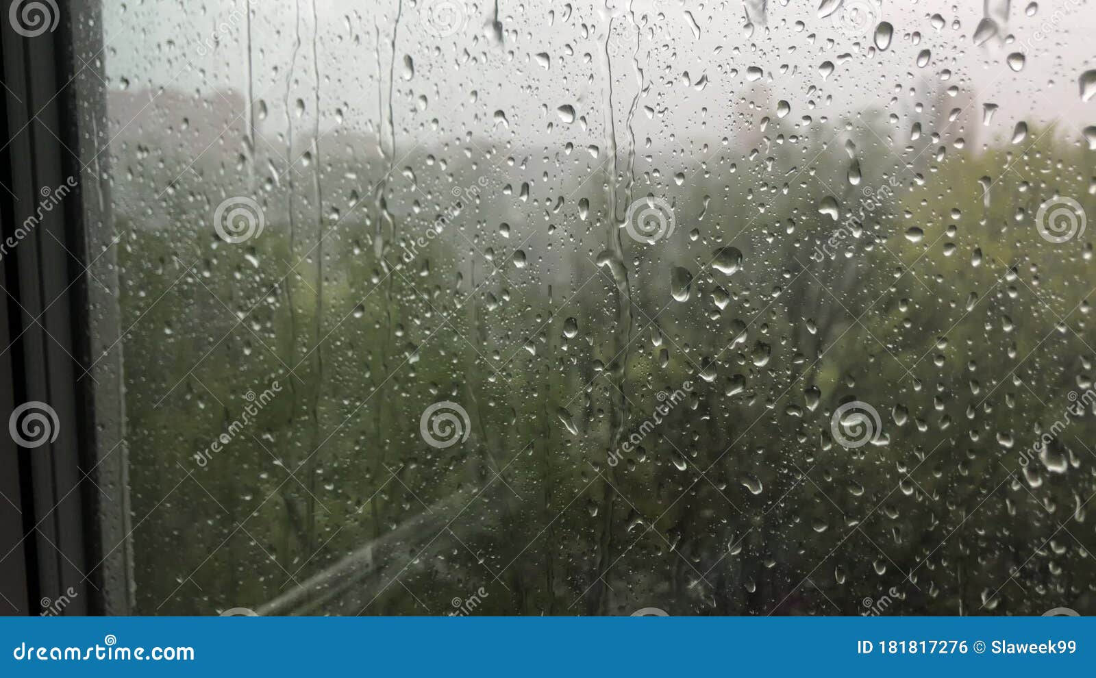 Outside the Window the Heavy Rain and Strong Wind, Drops Flow Down the ...