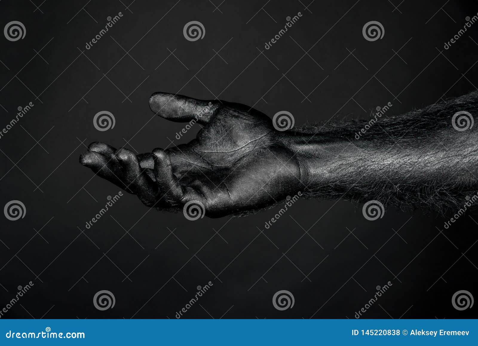 Outstretched Hand Completely in Black Paint Stock Photo - Image of ...