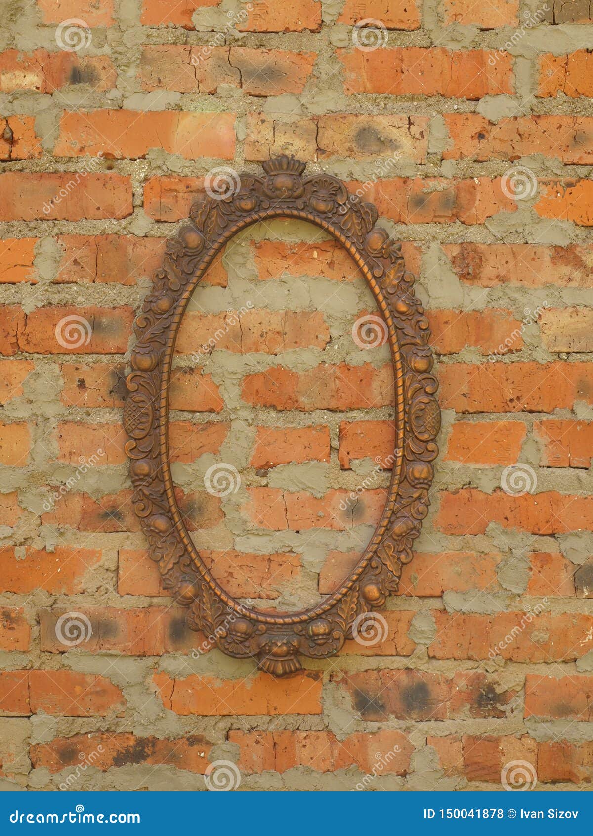 Oval Bronze Frame on the Background of an Old Brick Wall Stock Photo ...