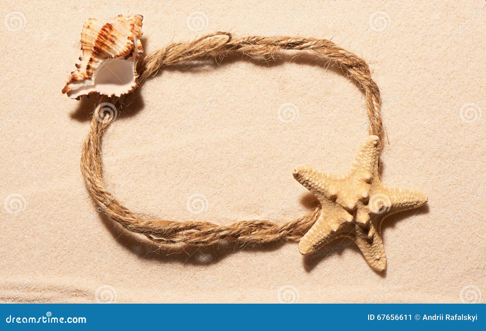 Oval Frame of Rope with Starfish and Seashell on Sand Stock Image ...