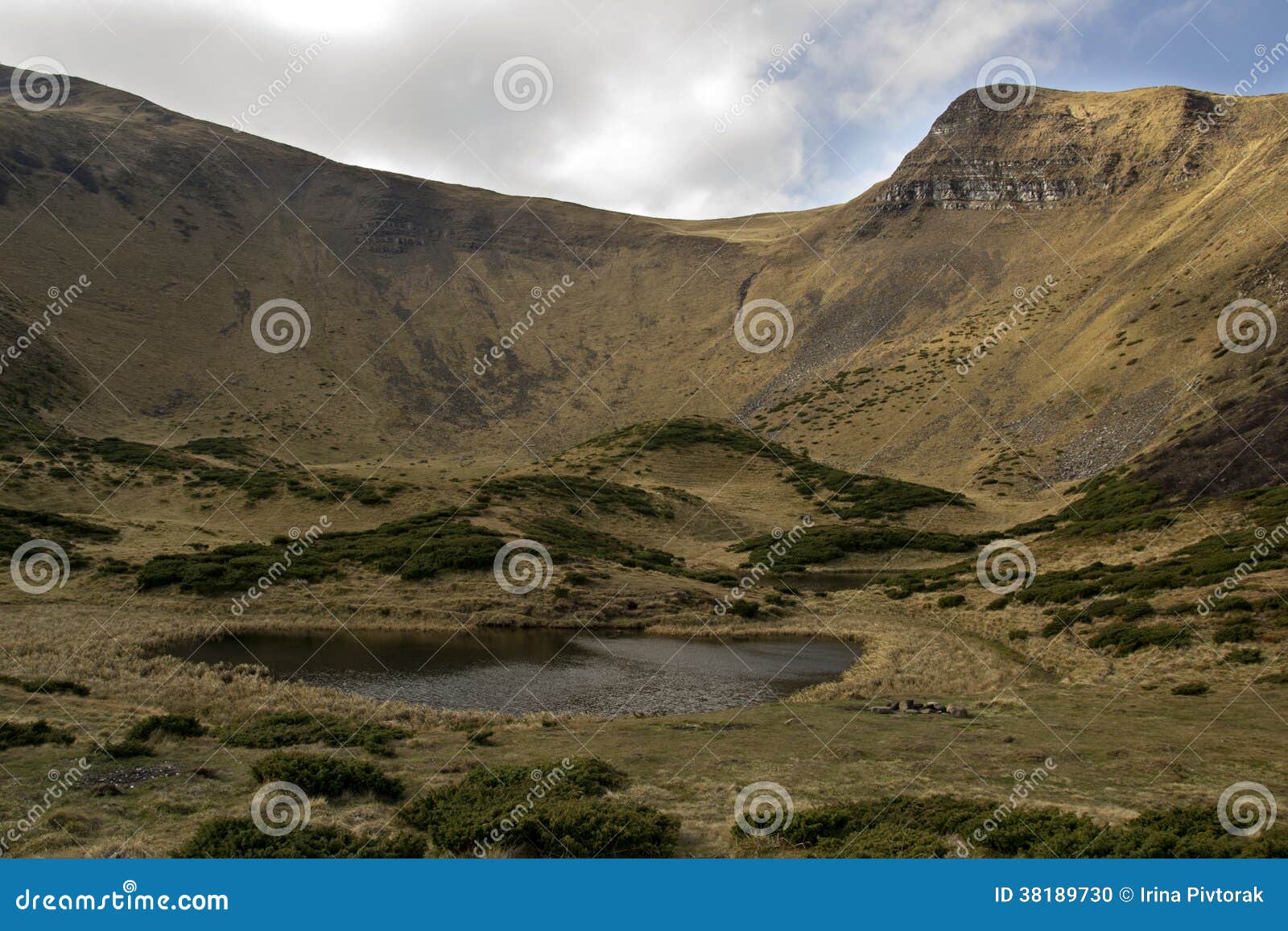 Oval lake at the foot stock photo. Image of lake, fence - 38189730