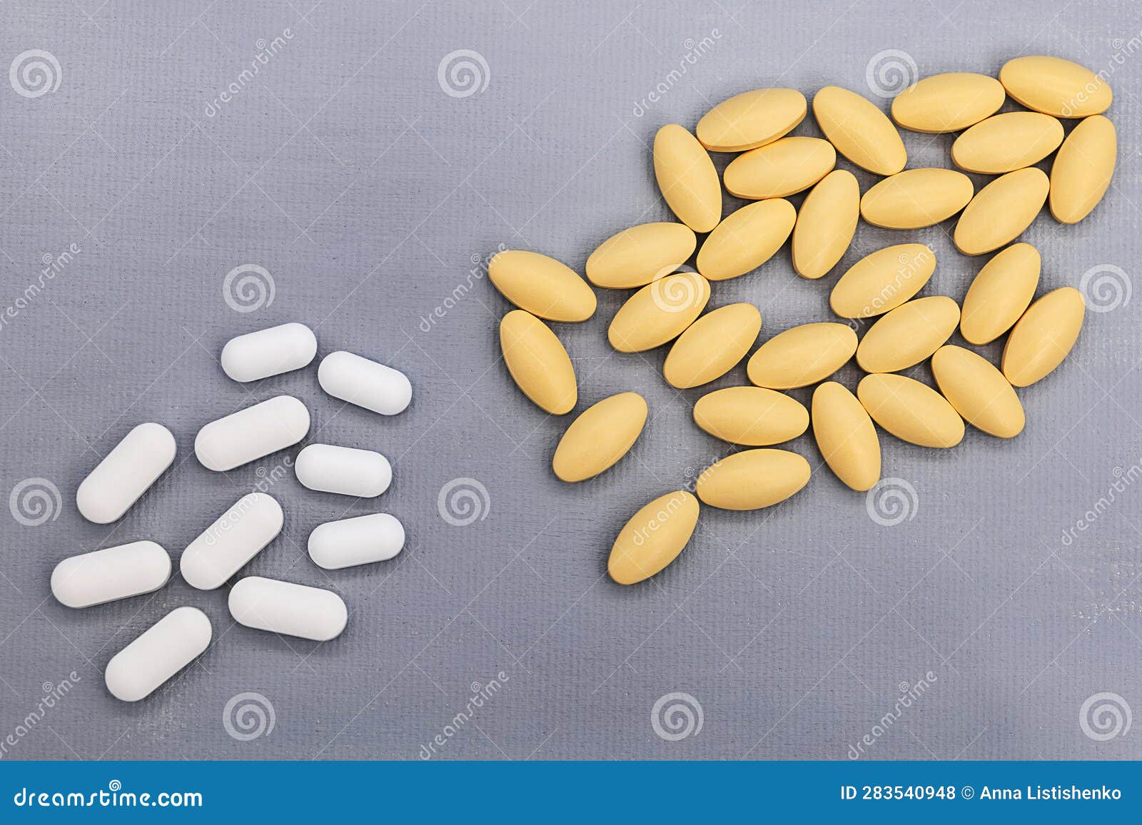 Oval-shaped Tablets Lie on Contrasting Background Stock Photo - Image ...