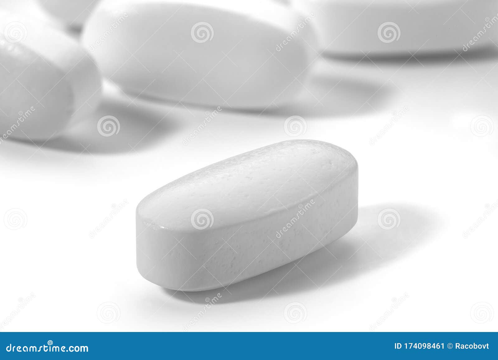 Oval Tablet Close-up on a White Stock Image - Image of tablet, oral ...