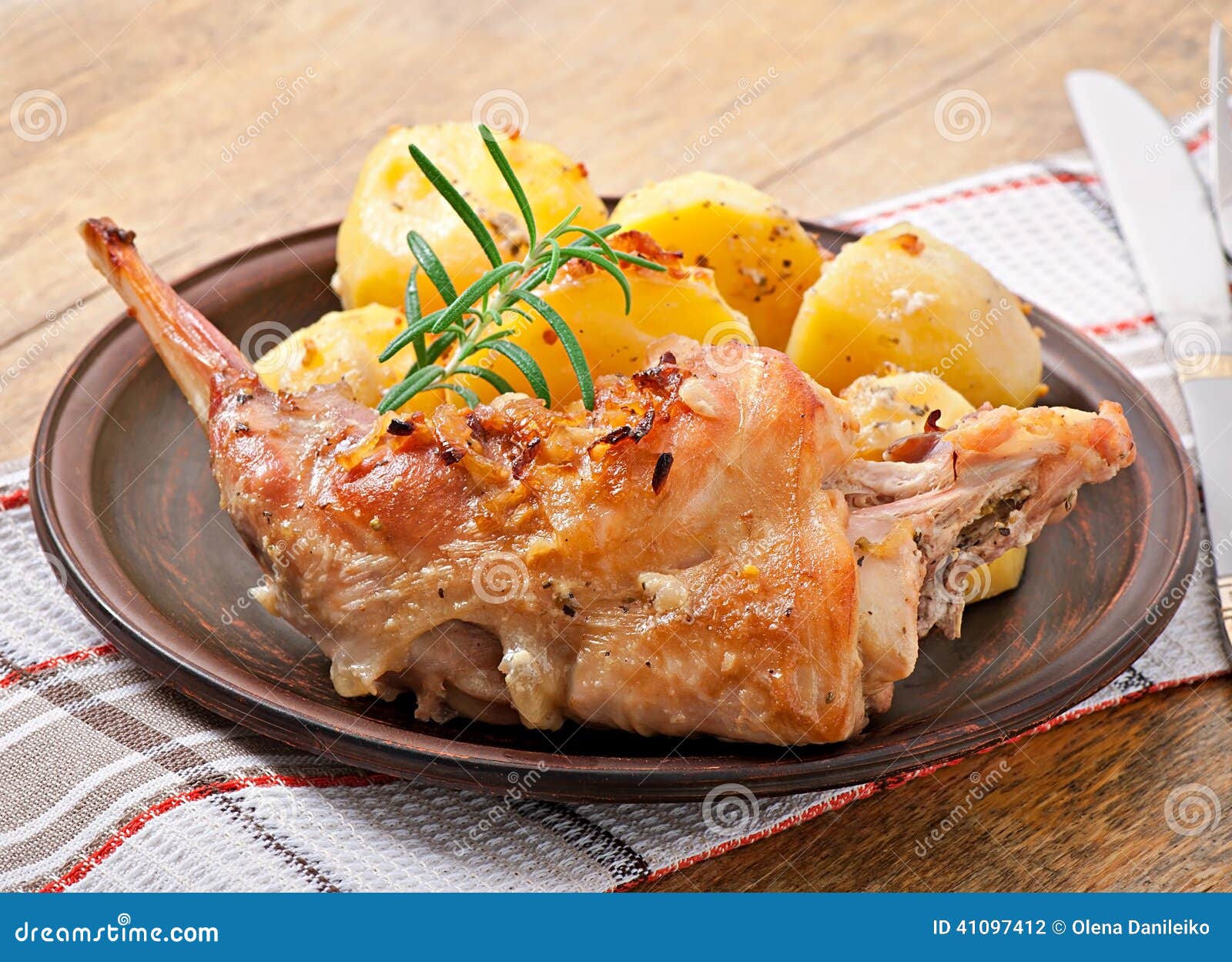 Oven Baked rabbit legs stock photo. Image of baked, hare - 41097412