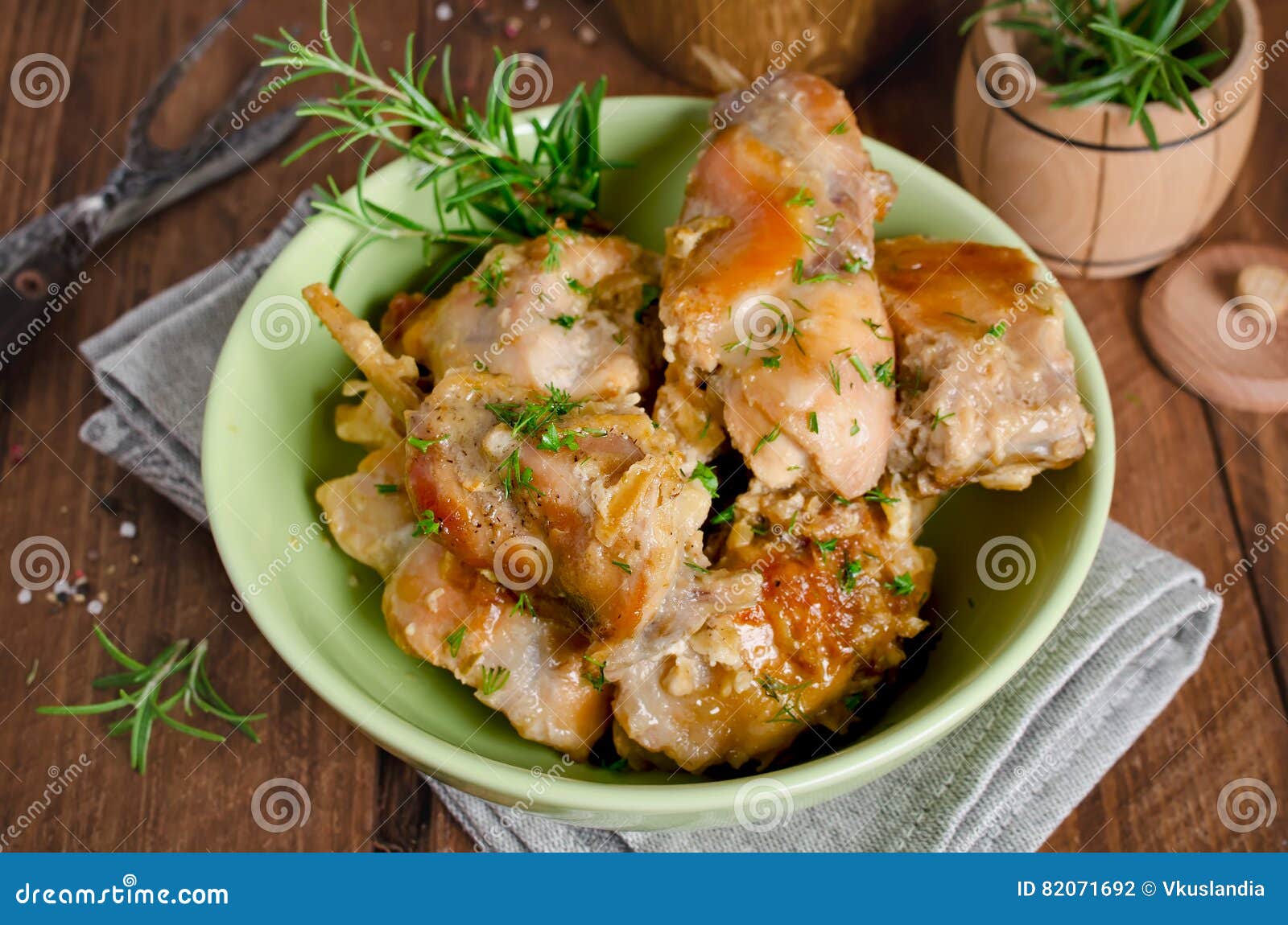Oven Baked Rabbit Legs with Potatoes and Rosemary Stock Photo - Image ...