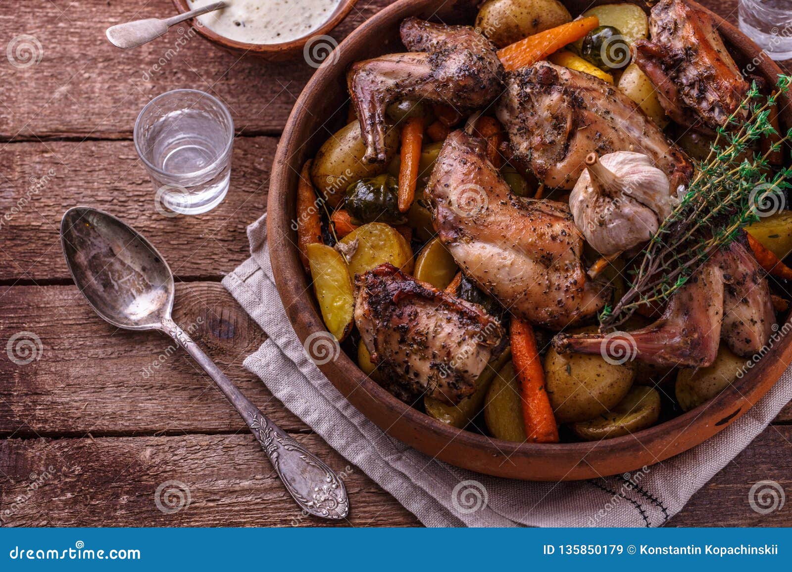 Oven Baked Rabbit with Root Vegetables and Herbs, Rustic Style Stock ...