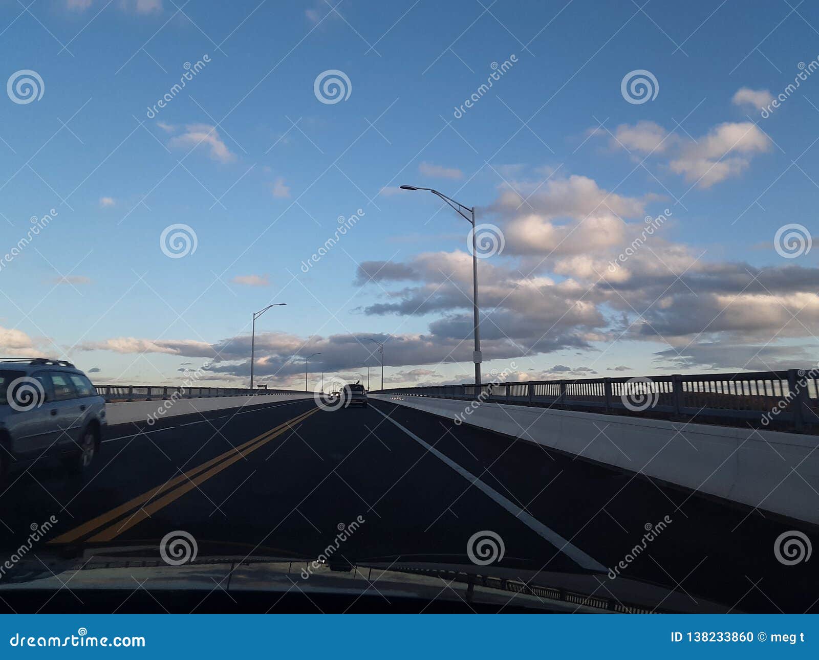 Over the Bridge into the Clouds Stock Photo - Image of kingston, clouds ...