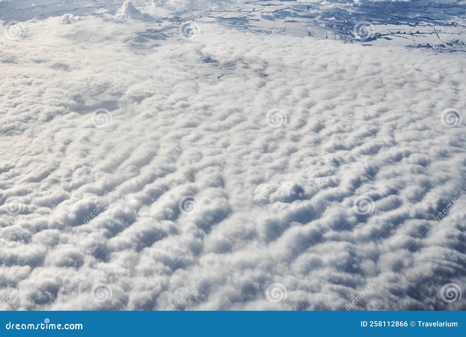 Over Clouds Top View from Aircraft Window, Thick White Blue Clouds ... Over Clouds Top View from Aircraft Window, Thick White Blue Clouds ...