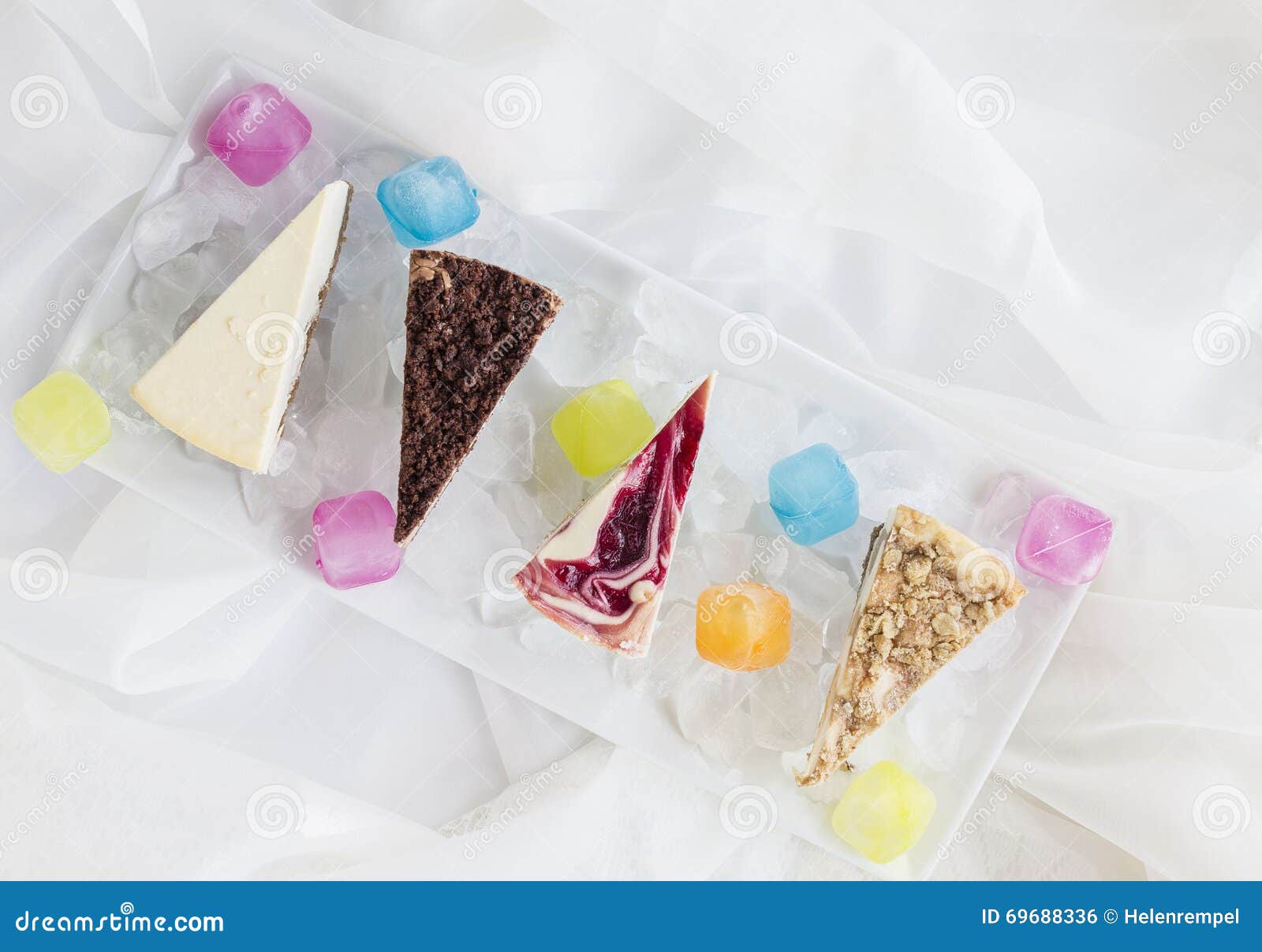Over Head View of Assorted Cheese Cakes Set on Ice Cubes in a White ...