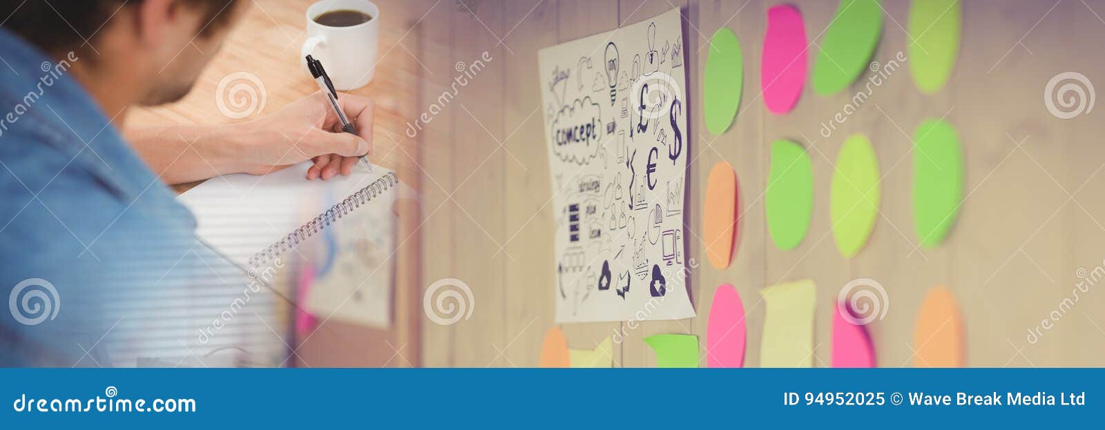 Over Shoulder of Man Writing in Notepad with Blurry Sticky Notes ...