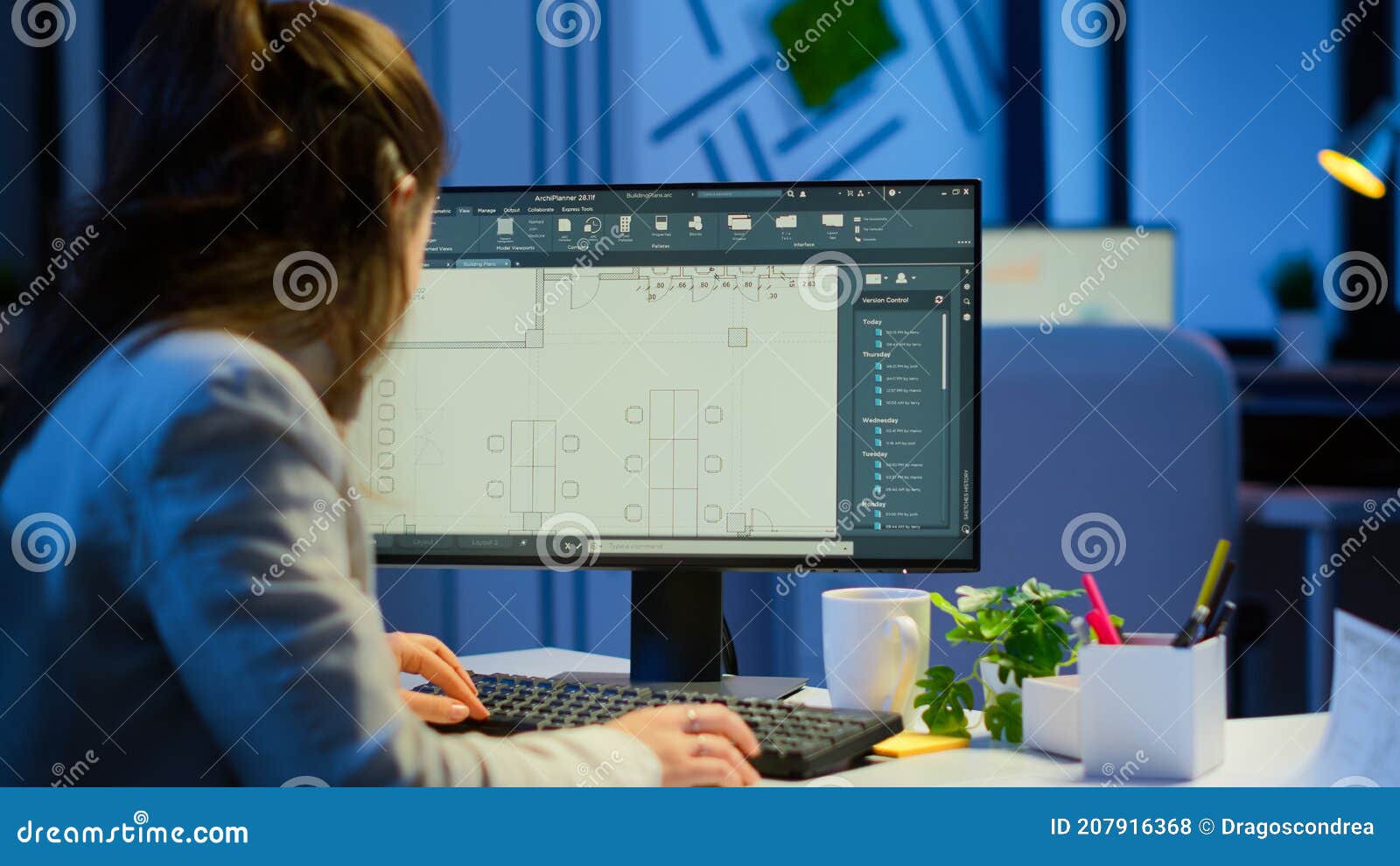 Over the Shoulder Shot of Engineer Working with Architectural Plans ...