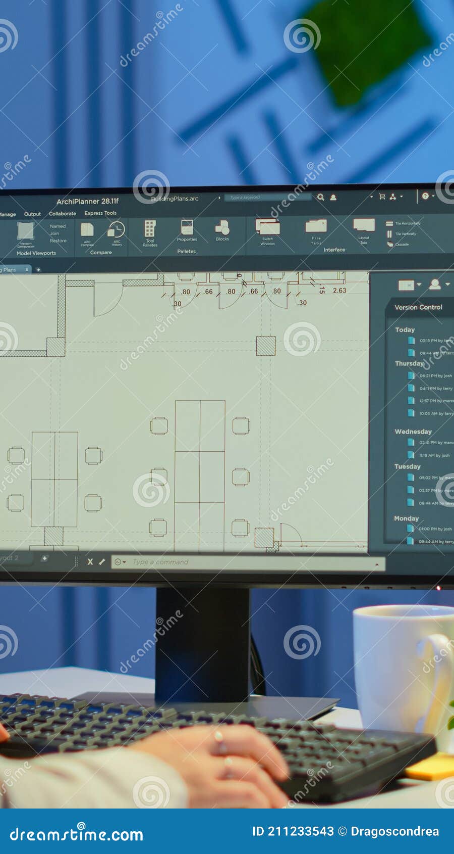 Over the Shoulder Shot of Engineer Working with Architectural Plans ...