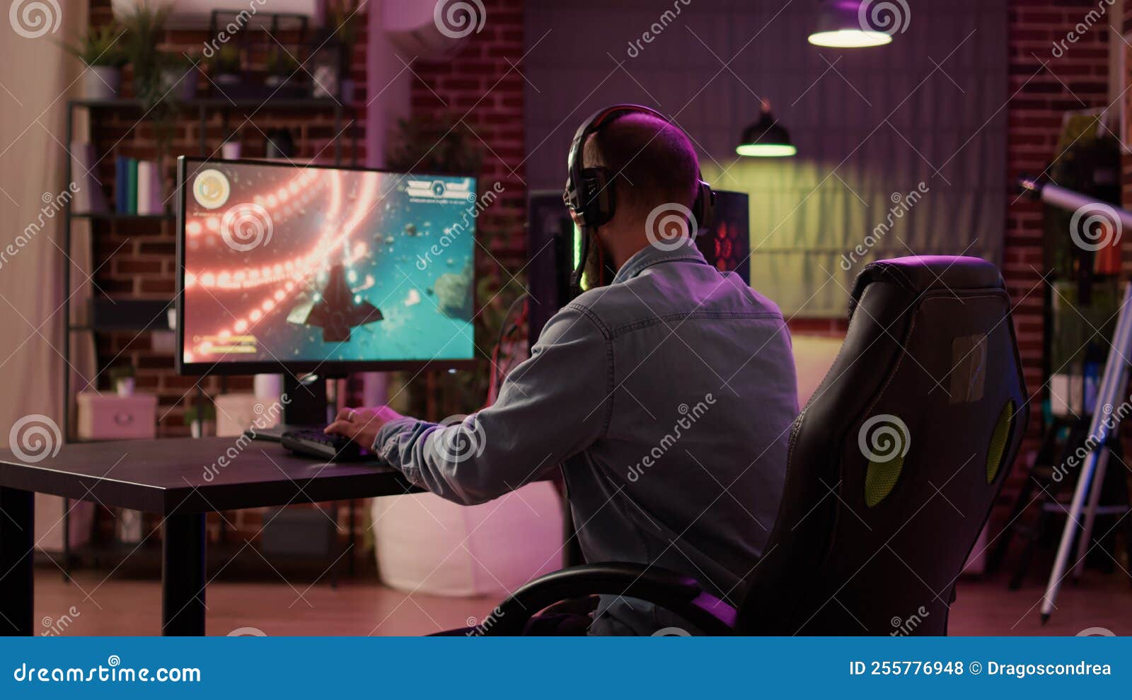 Over Shoulder View of Caucasian Man Using Pc Setup Playing Multiplayer ...