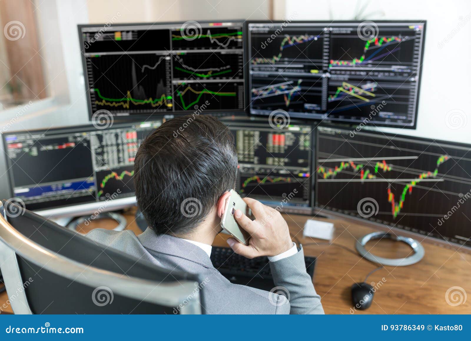 Over the Shoulder View of Stock Broker Trading Online, Talking on ...