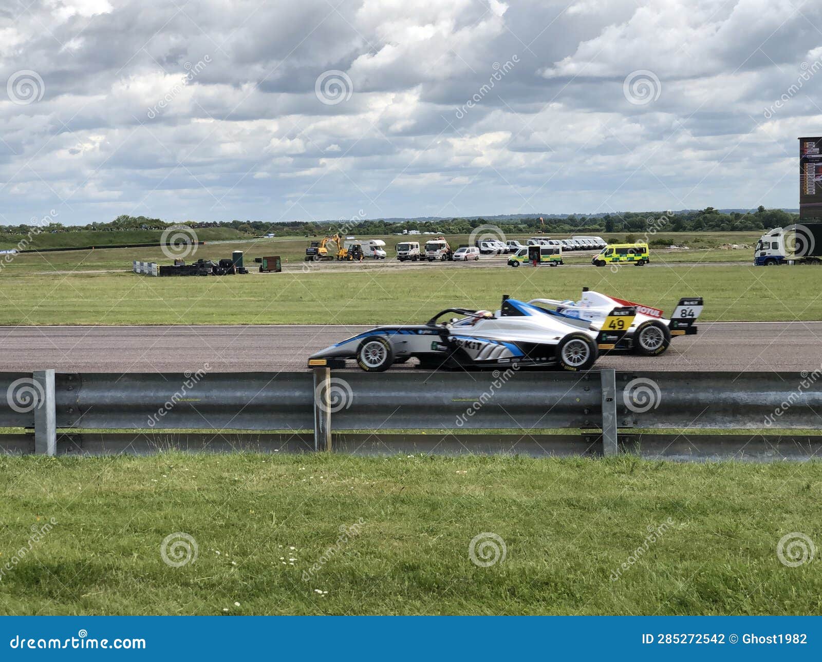 Over Taking Battle it Out on a Race Track Editorial Photography - Image ...