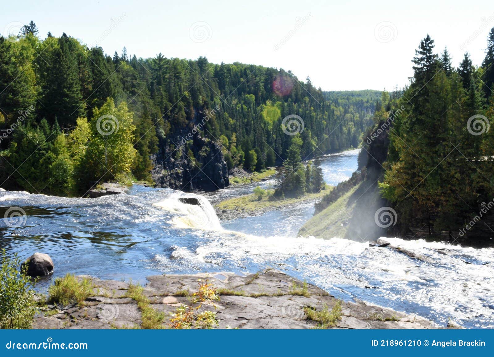 Over the Waterfalls Edge into the Trees Stock Photo - Image of river ...