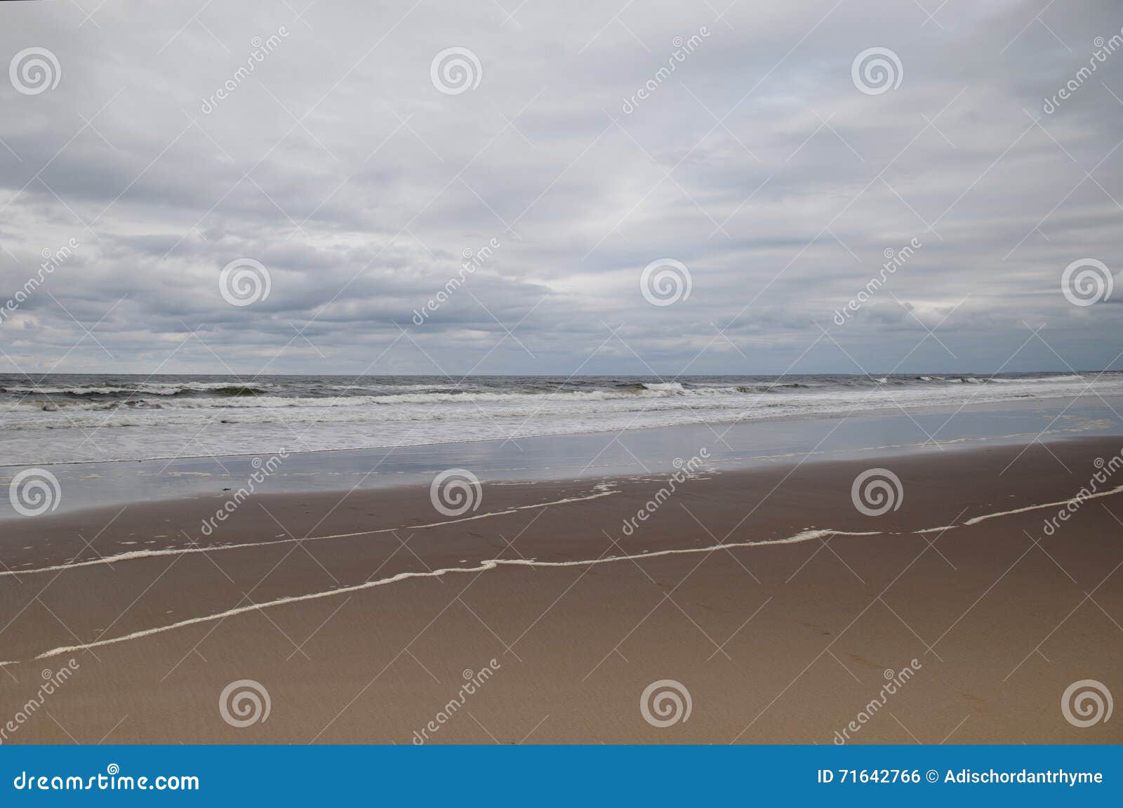 Overcast beach stock photo. Image of clouds, england - 71642766