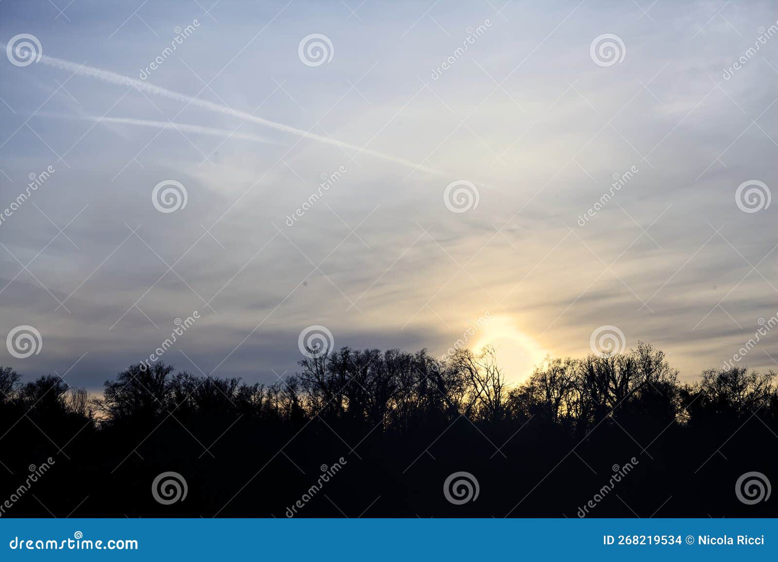 Overcast Sunset Sky with Silhouette of a Park Stock Photo - Image of ...