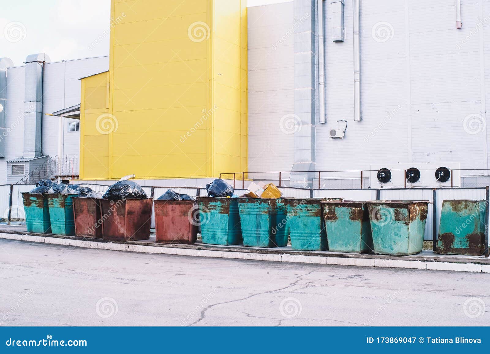 Overflowing Garbage Containers with Garbage Near an Industrial Building ...