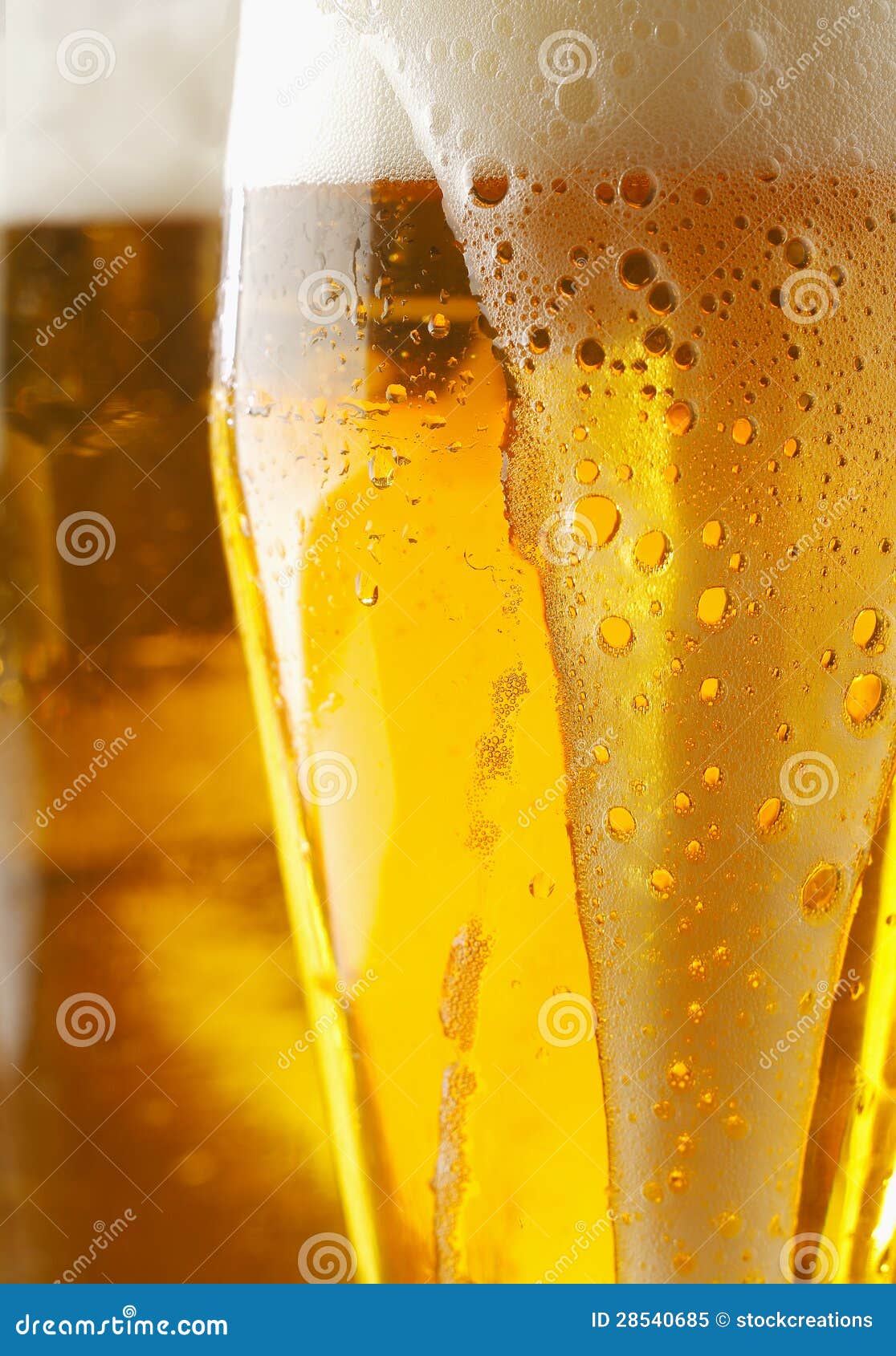 Overflowing Glass of Golden Ale Stock Image - Image of drops, close ...